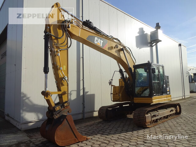 Caterpillar 325FL bager guseničar