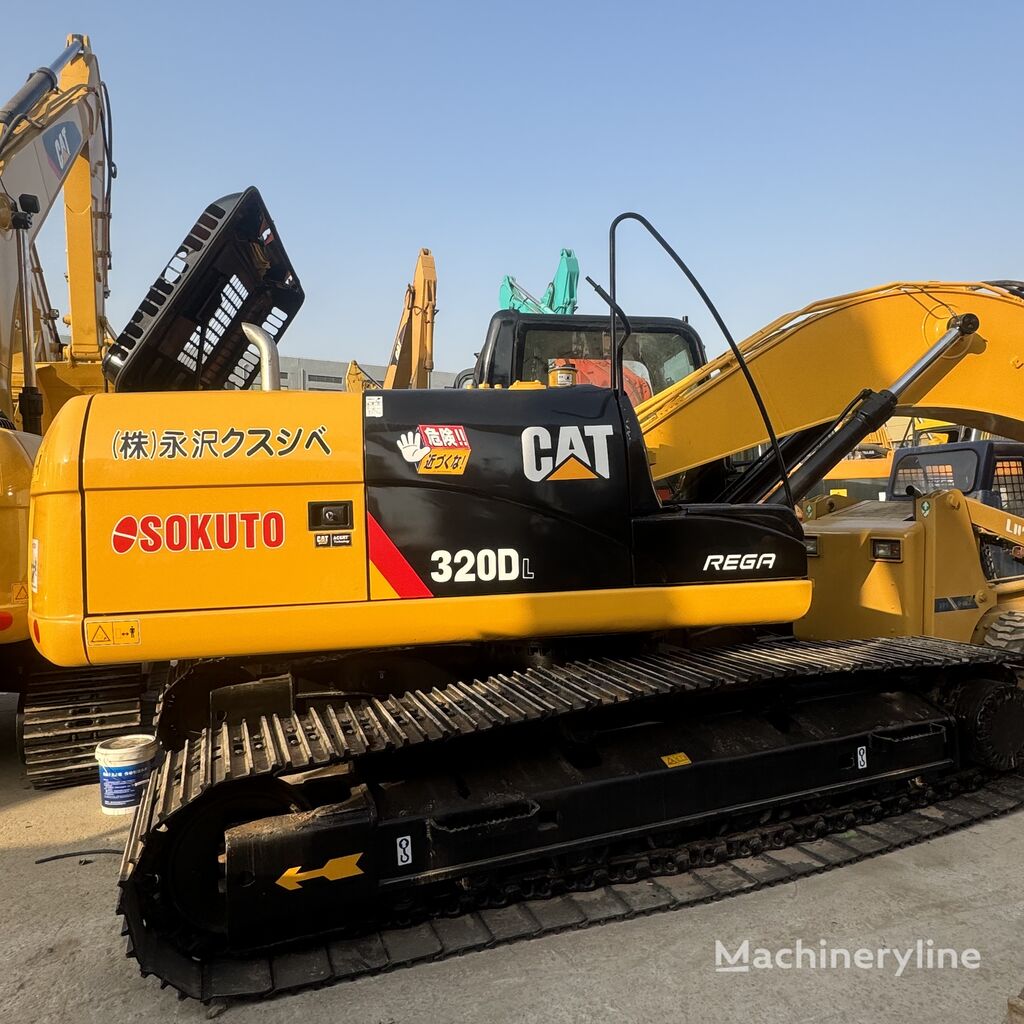 Caterpillar 320DL bager guseničar