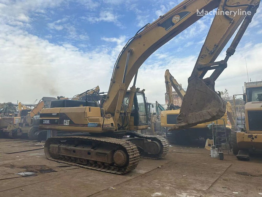 Caterpillar 330BL bager guseničar