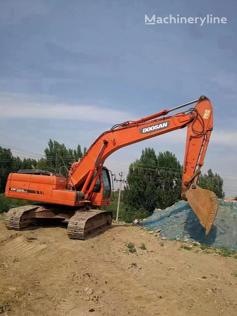 Doosan DX225LC bager guseničar