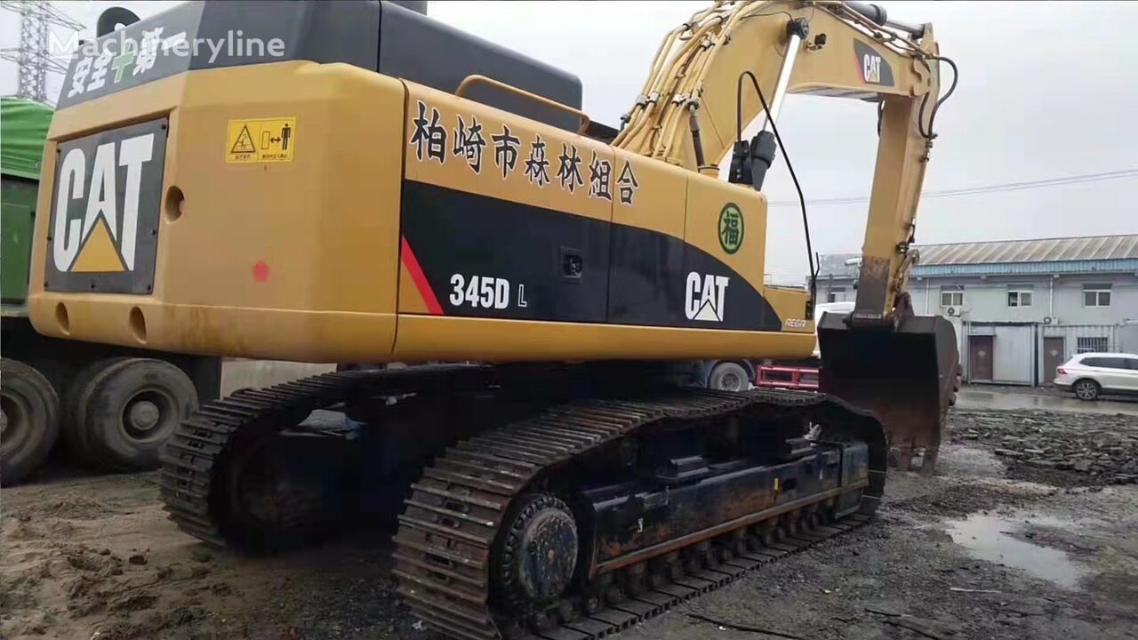 Caterpillar 345DL bager guseničar