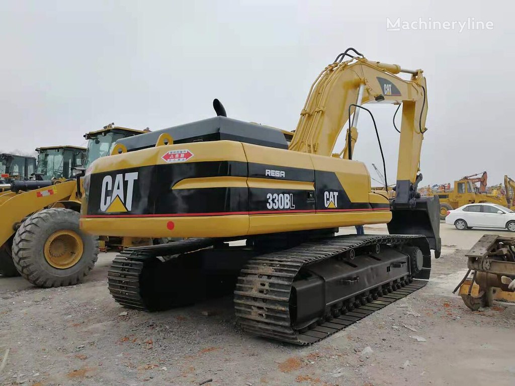 Caterpillar 330BL bager guseničar