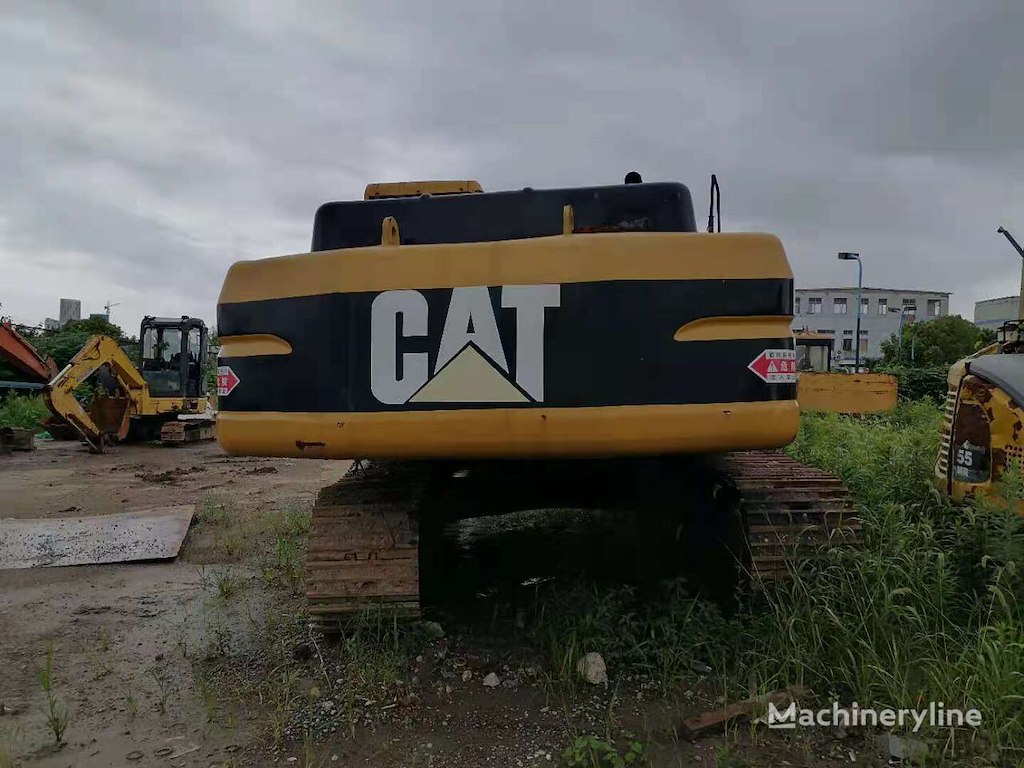 Caterpillar 325BL bager guseničar