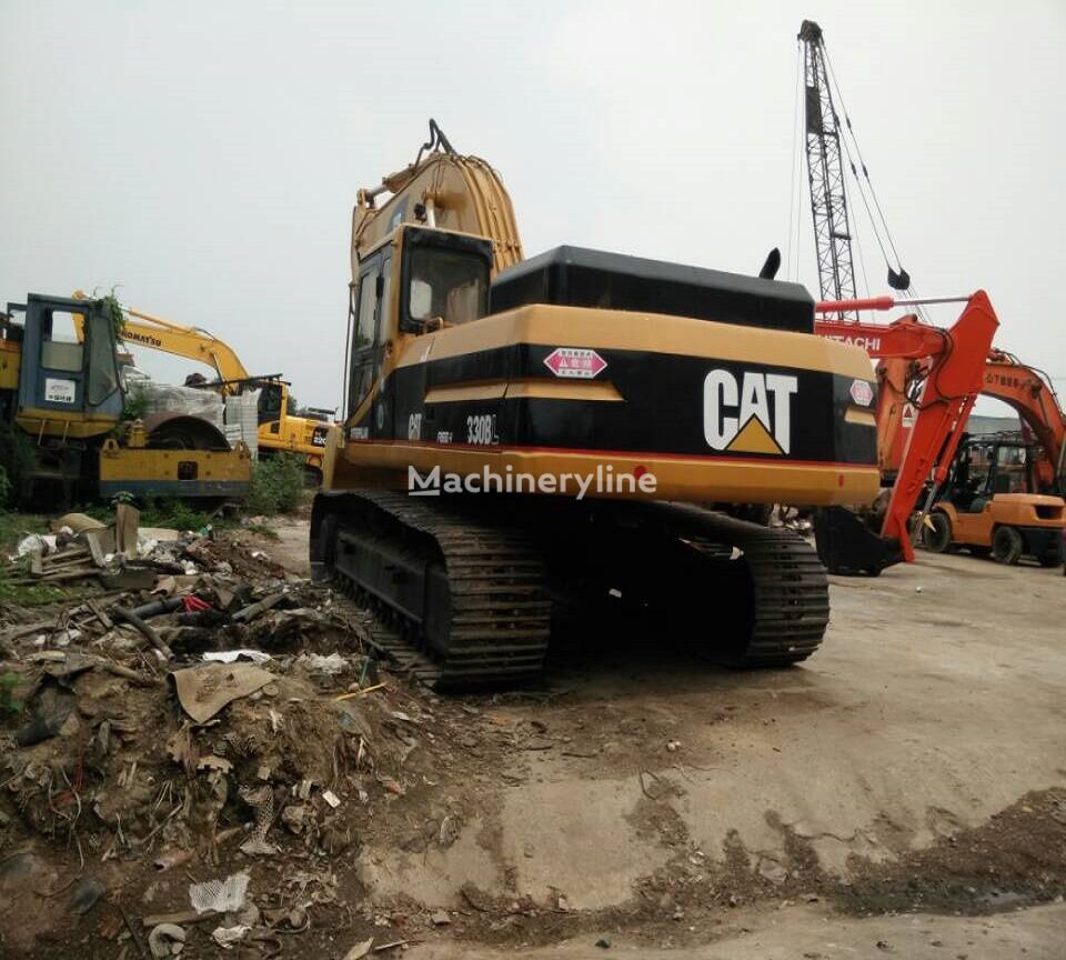 Caterpillar 330BL bager guseničar