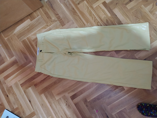 zute nove kozne pantalone-snizene 1000