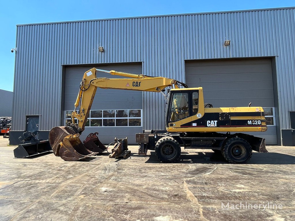 Caterpillar M320 complete with 4 buckets and hammer available bager točkaš