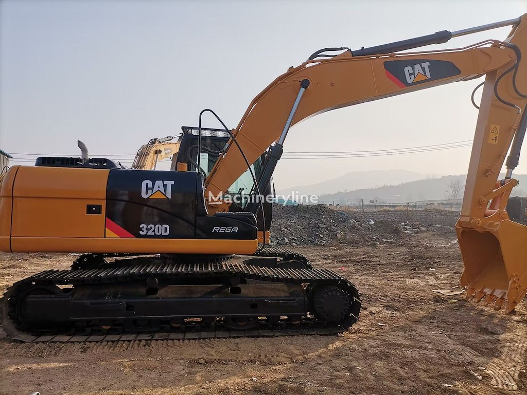 Caterpillar 320DL bager guseničar