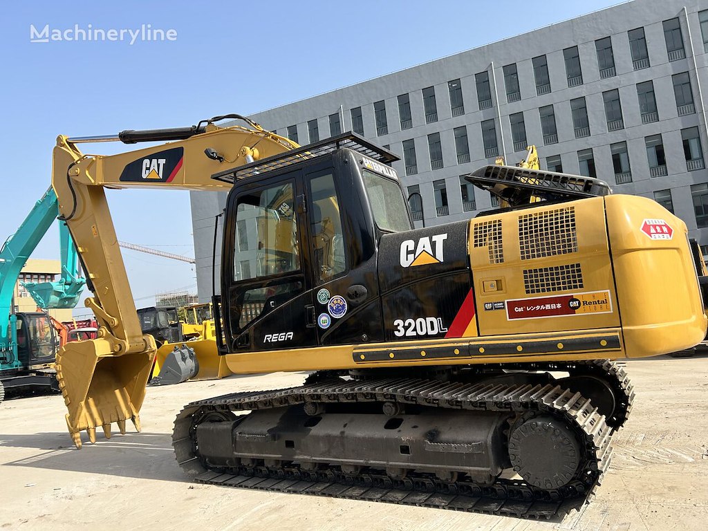 Caterpillar 320DL bager guseničar