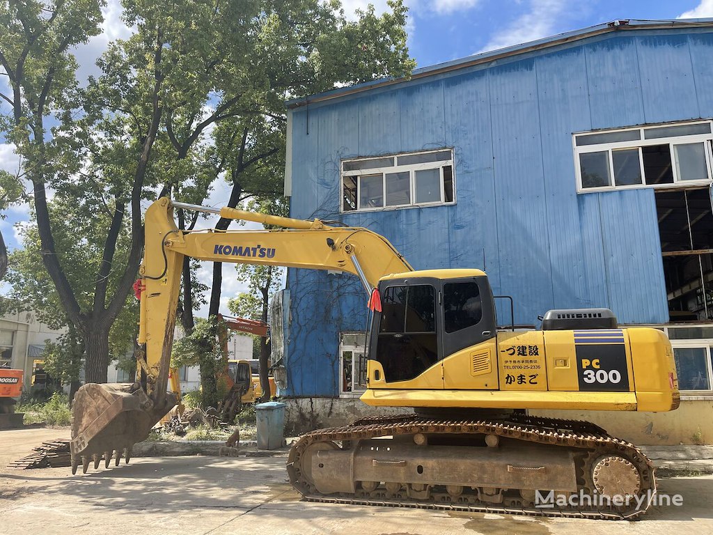 Komatsu PC300 bager guseničar