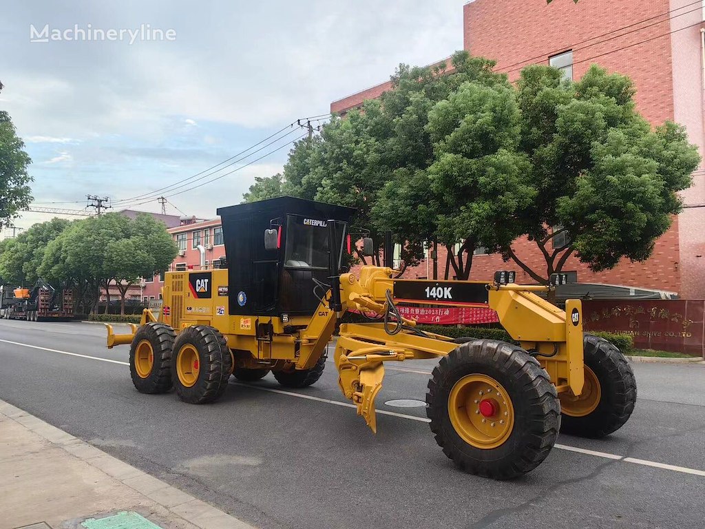 Caterpillar 140K vučeni grejder