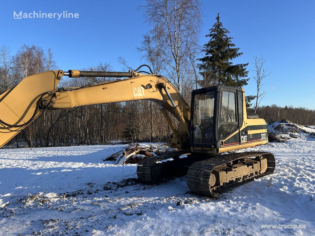 Caterpillar Roomikekskavaator bager guseničar