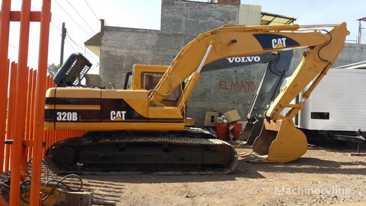 Caterpillar 320BL bager guseničar