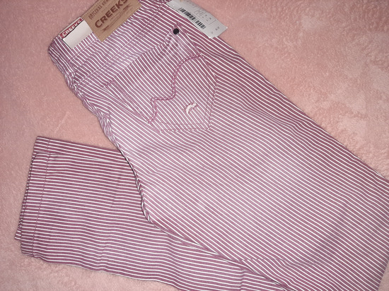 Nove roze pantalone sa etiketom
