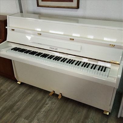 Maeary white piano