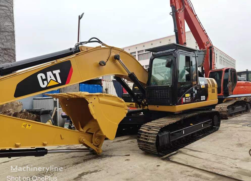 Caterpillar 323D 323DL bager guseničar