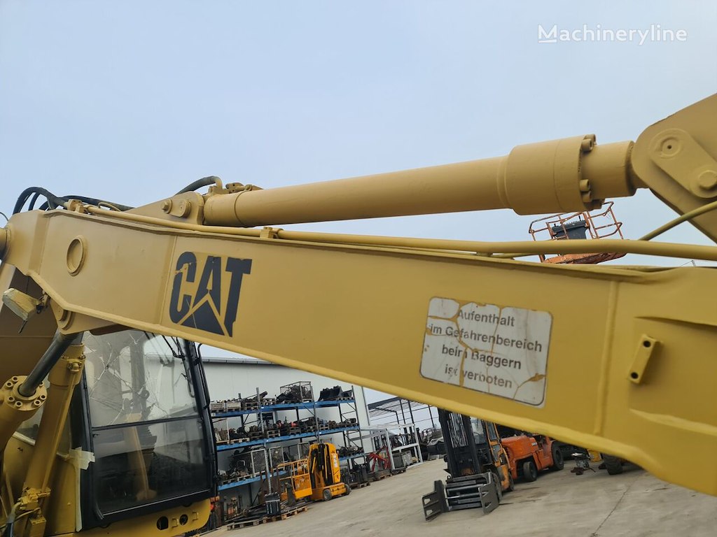 Caterpillar M312 bager točkaš