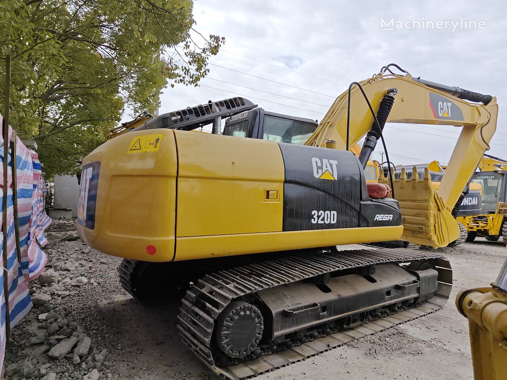 Caterpillar 320D bager guseničar