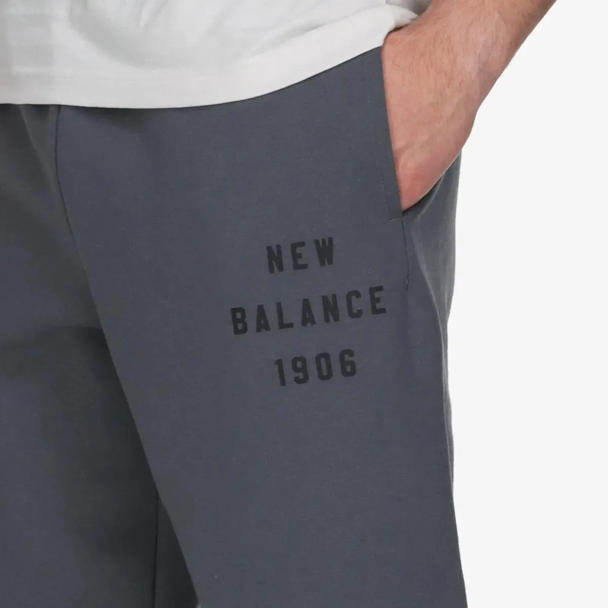 NEW BALANCE Donji deo trenerke FLEECE GRAPHIC JOGGER