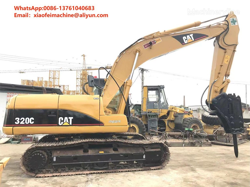 Caterpillar 320C Excavator with breaker hammer bager guseničar