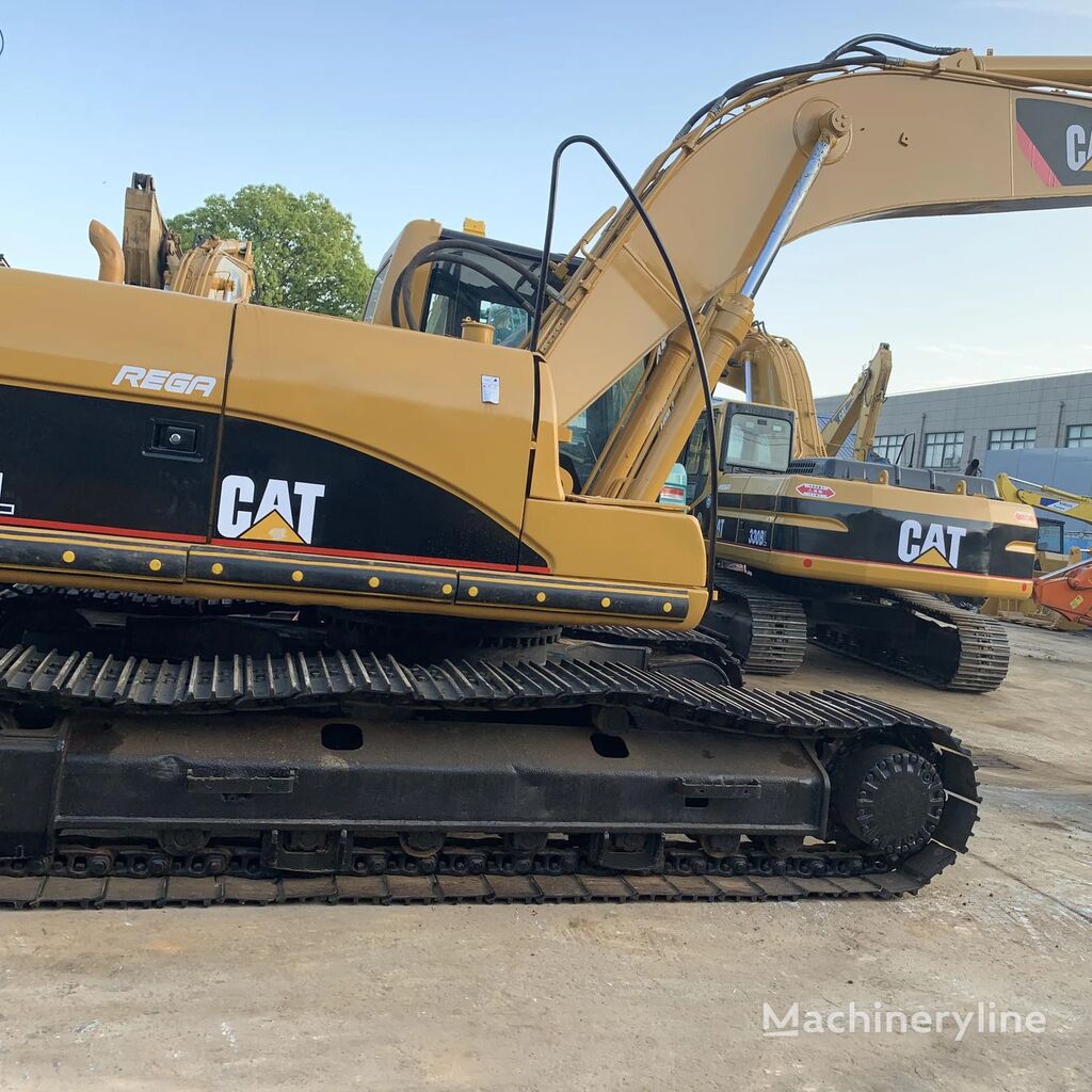 Novi Caterpillar 320c bager guseničar