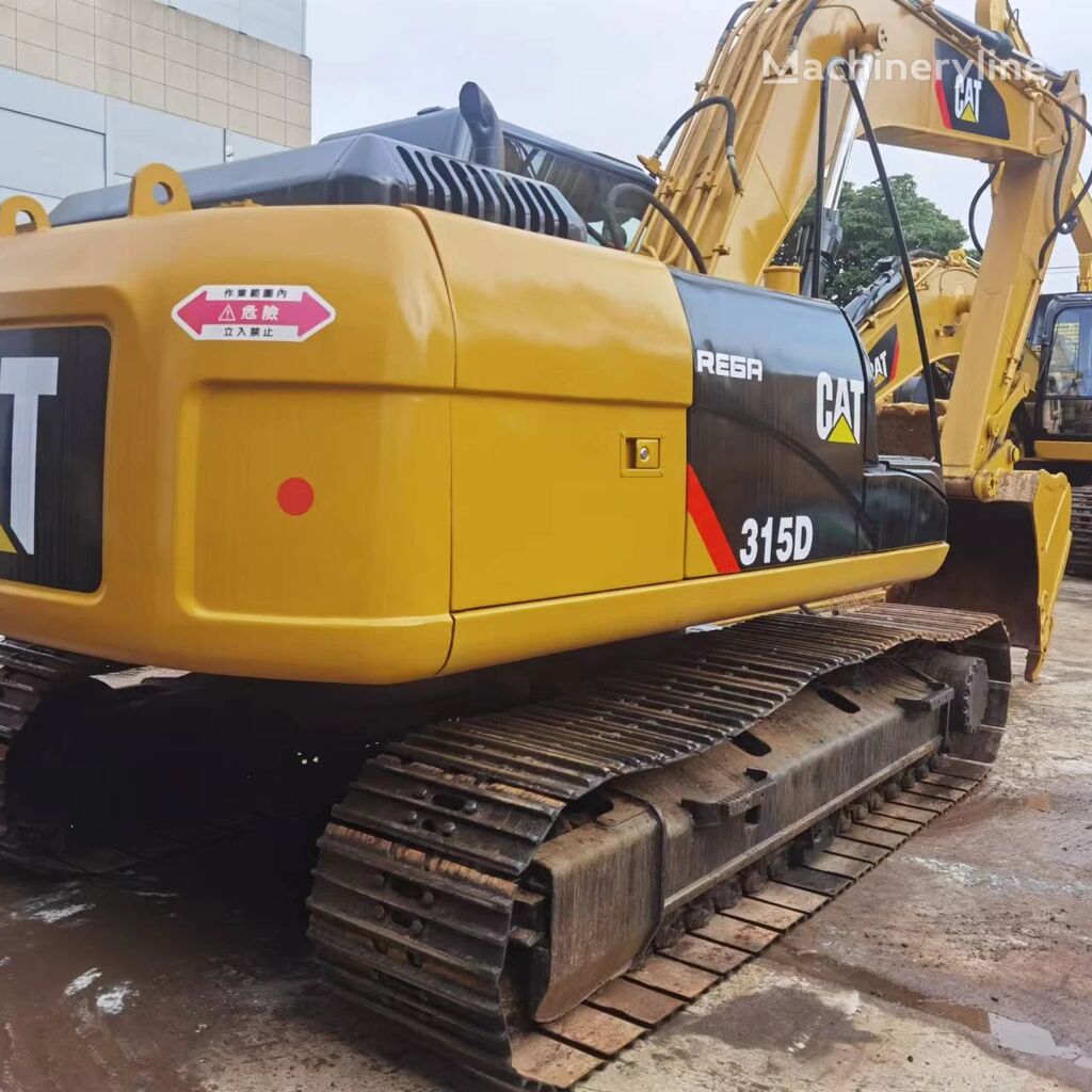 Novi Caterpillar 312C bager guseničar