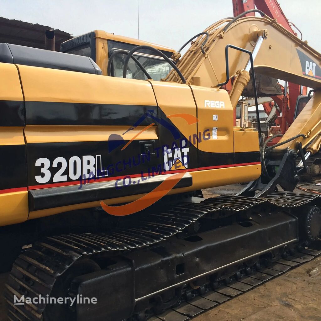 Novi Caterpillar 320BL bager guseničar