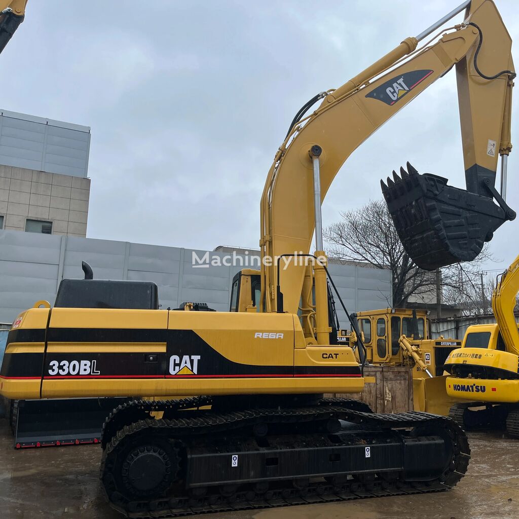 Novi Caterpillar 330BL bager guseničar