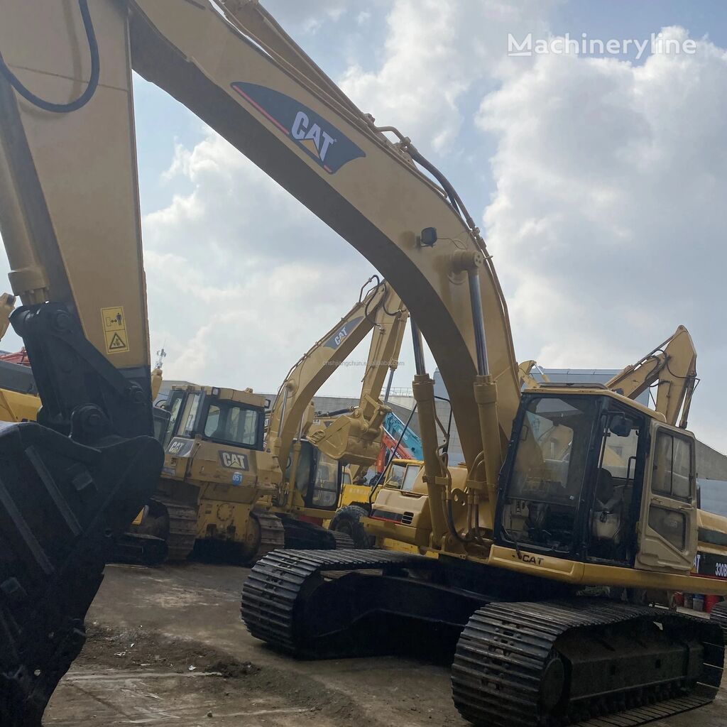 Novi Caterpillar 330BL bager guseničar