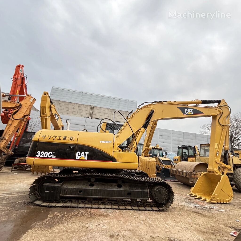 Novi Caterpillar 320CL bager guseničar