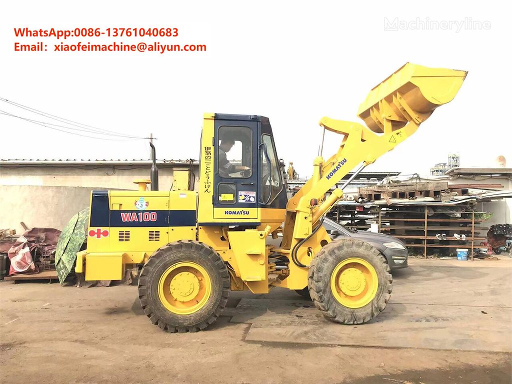 Komatsu WA100 prednji utovarivač