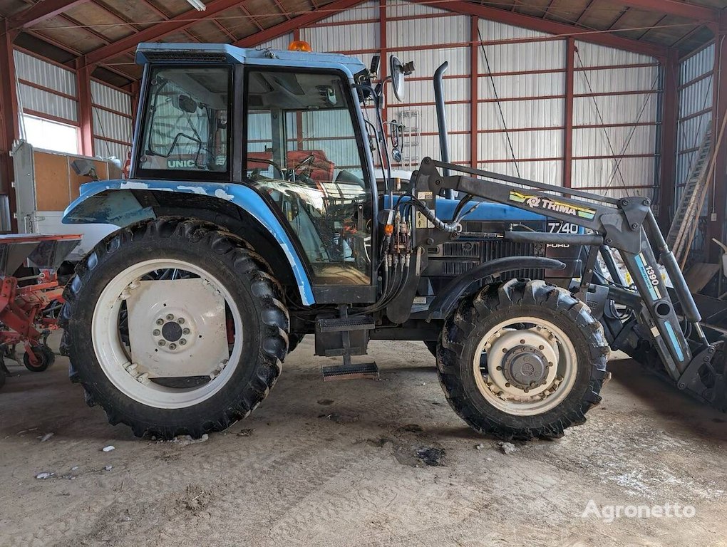New Holland 7740 with Attachment traktor točkaš