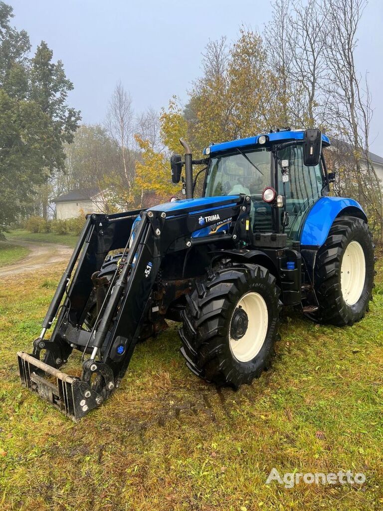 Prodaje se New Holland T7 185 med komplett frontlaster og fronthydraulikk traktor točkaš na aukciji