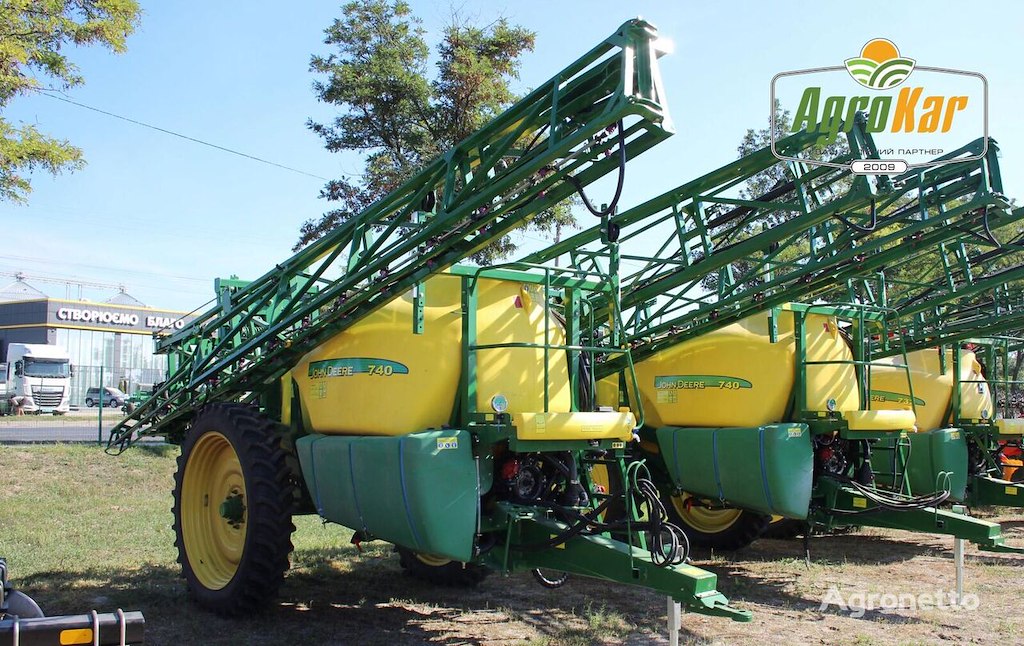 John Deere 740 - 28 metri vučena prskalica