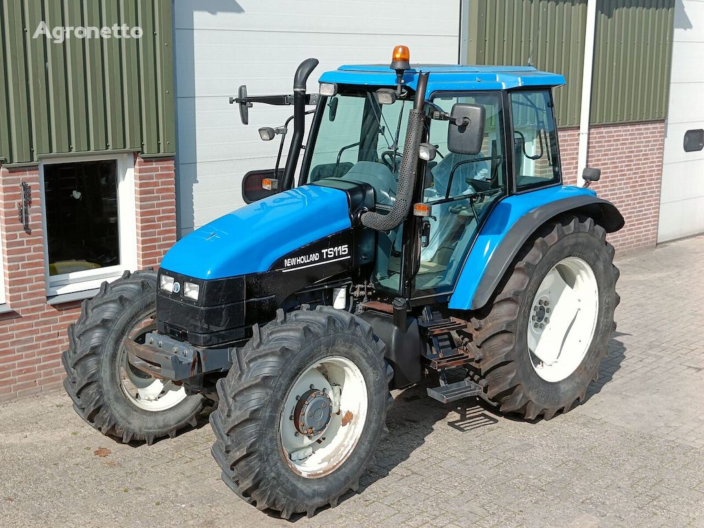 New Holland TS115 traktor točkaš
