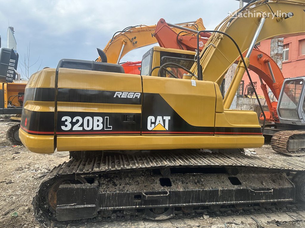 Caterpillar 320BL bager guseničar