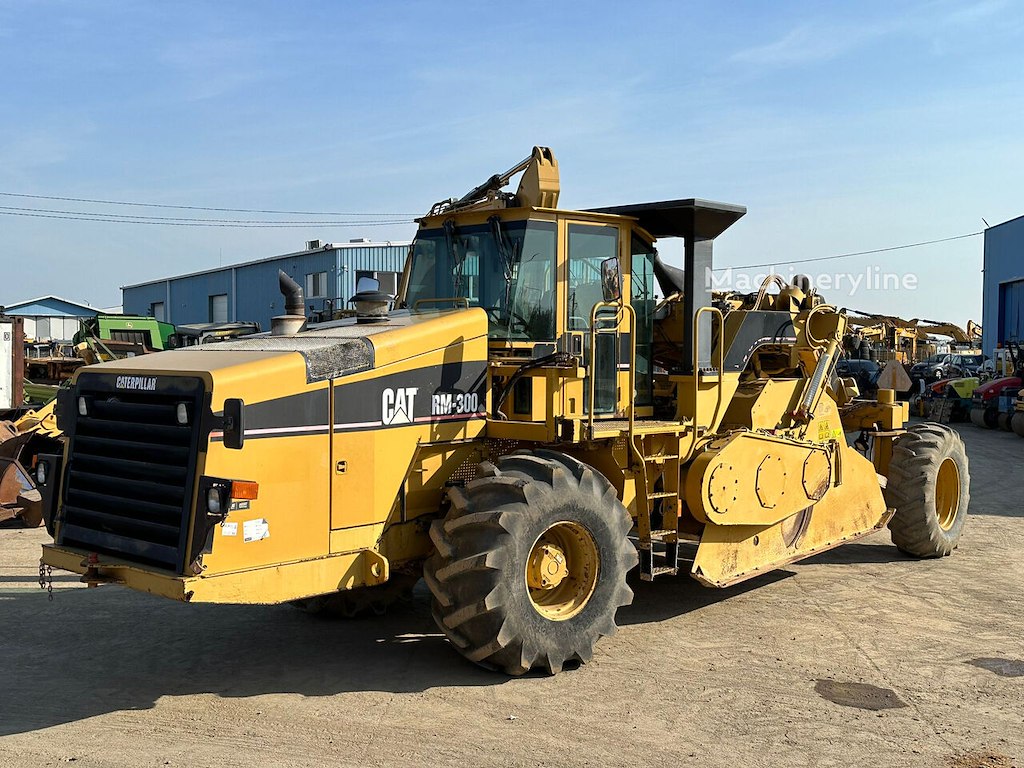 Caterpillar RM300 mašina za reciklažu asfalta