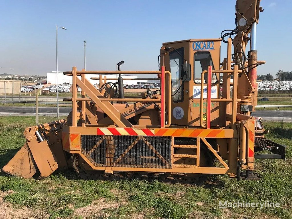 Traxcavator Con Grúa buldožer