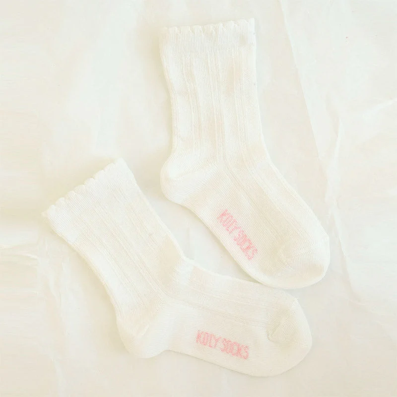 Cream Elegant Ribbed Socks
Cream Elegant Ribbed Socks