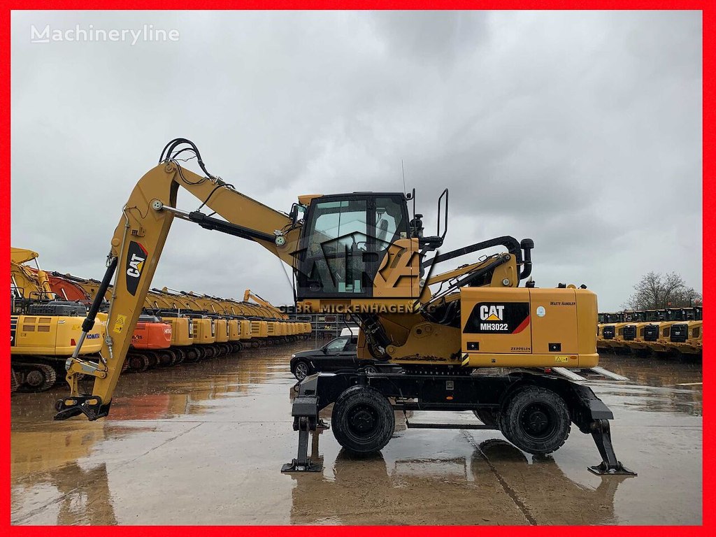 Caterpillar M 3022 MH bager za pretovar