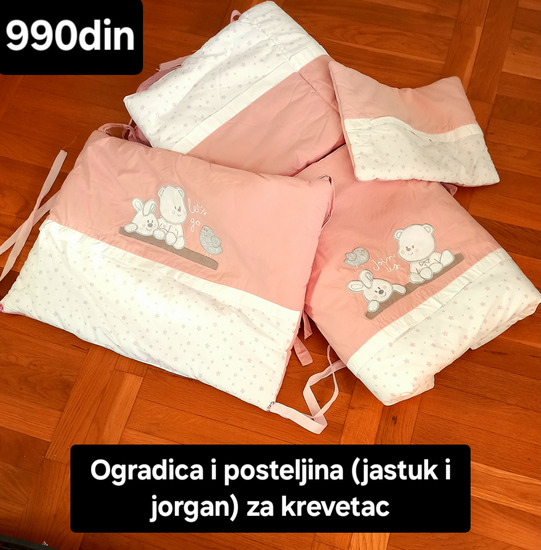 Ogradica i posteljina za krevetac bebe roze