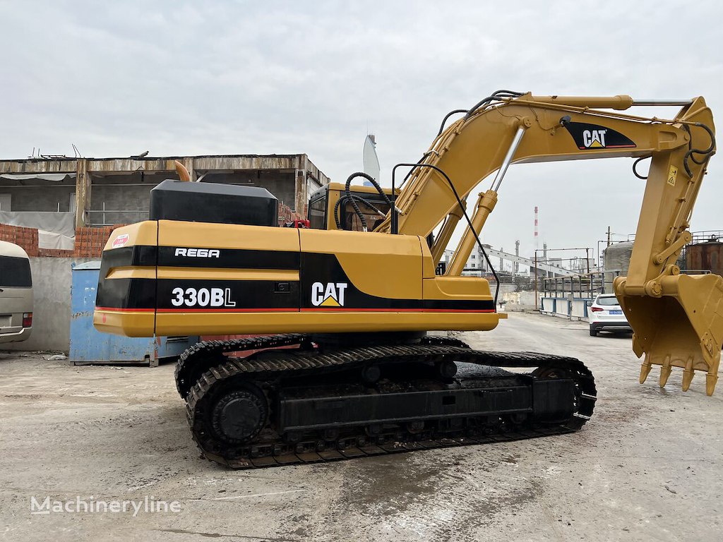 Caterpillar 330BL bager guseničar