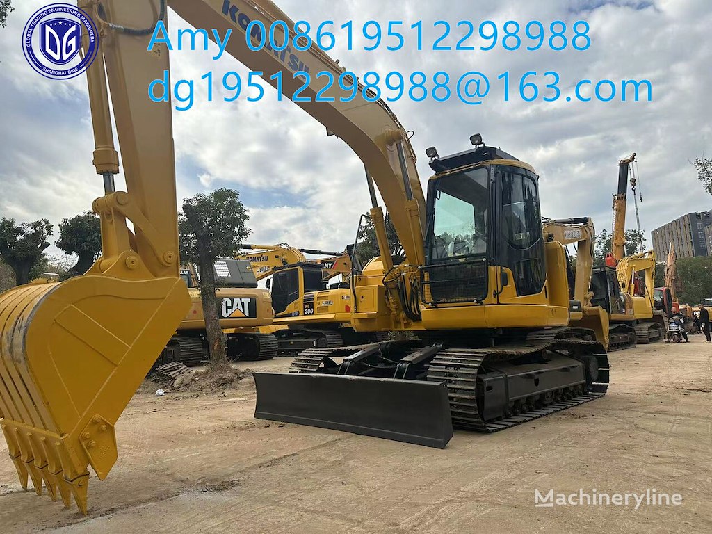 Komatsu PC128US bager guseničar