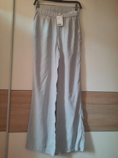 H&M nove pantalone golubije sive boje