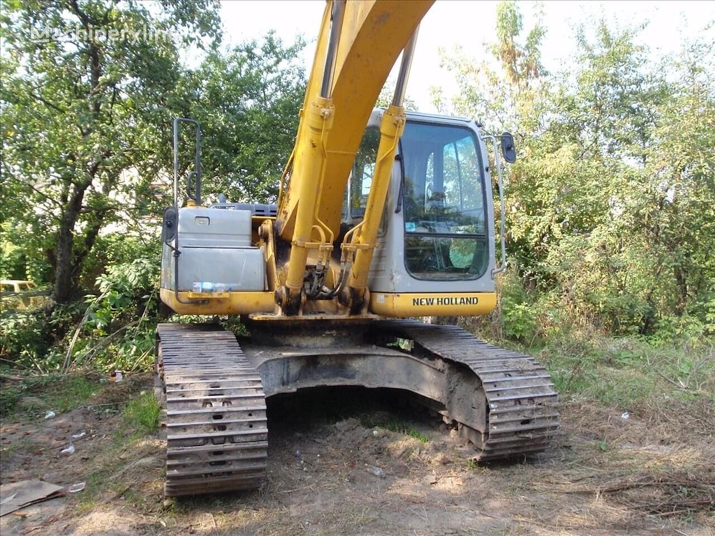 New Holland 215E bager guseničar