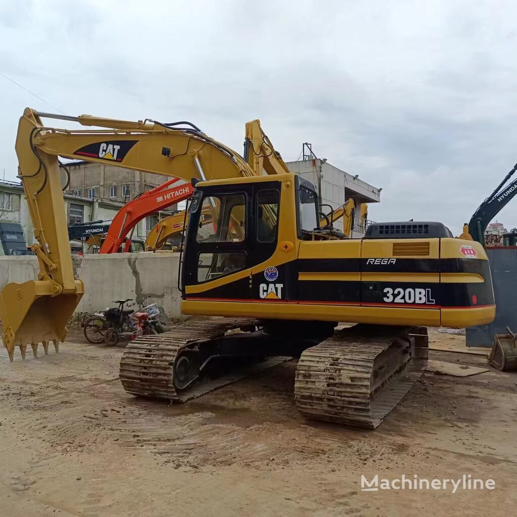 Caterpillar 320BL bager guseničar