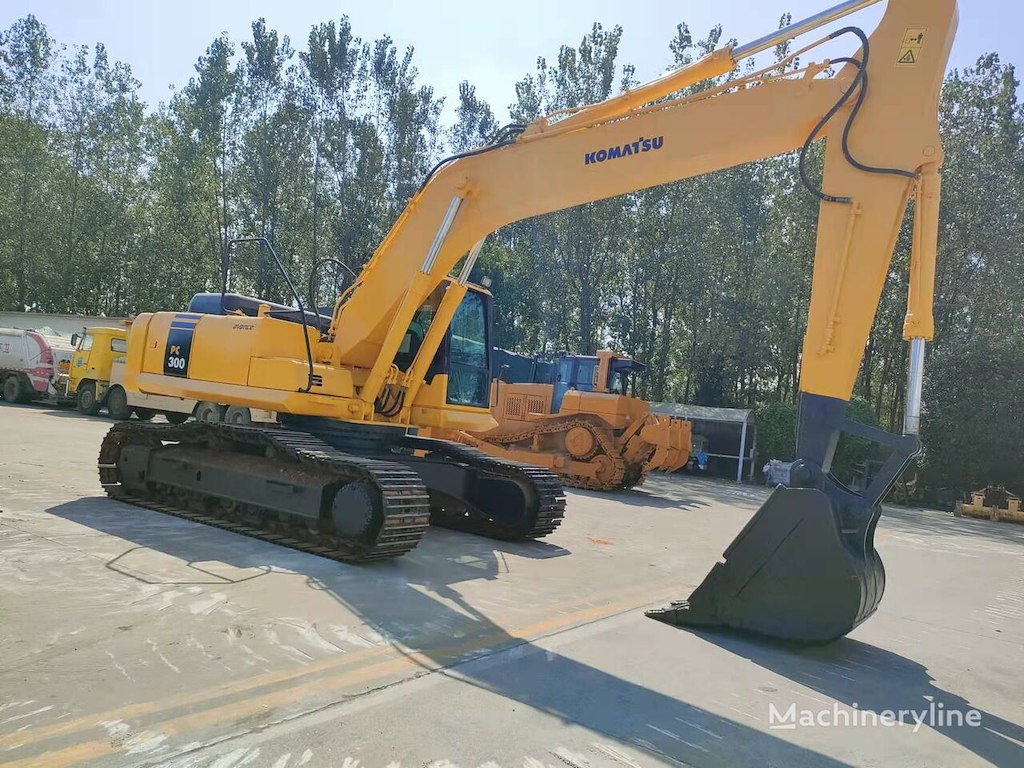 Komatsu PC300 bager guseničar