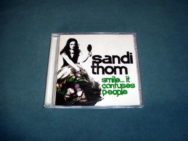 SANDI THOM – Smile... It Confuses People