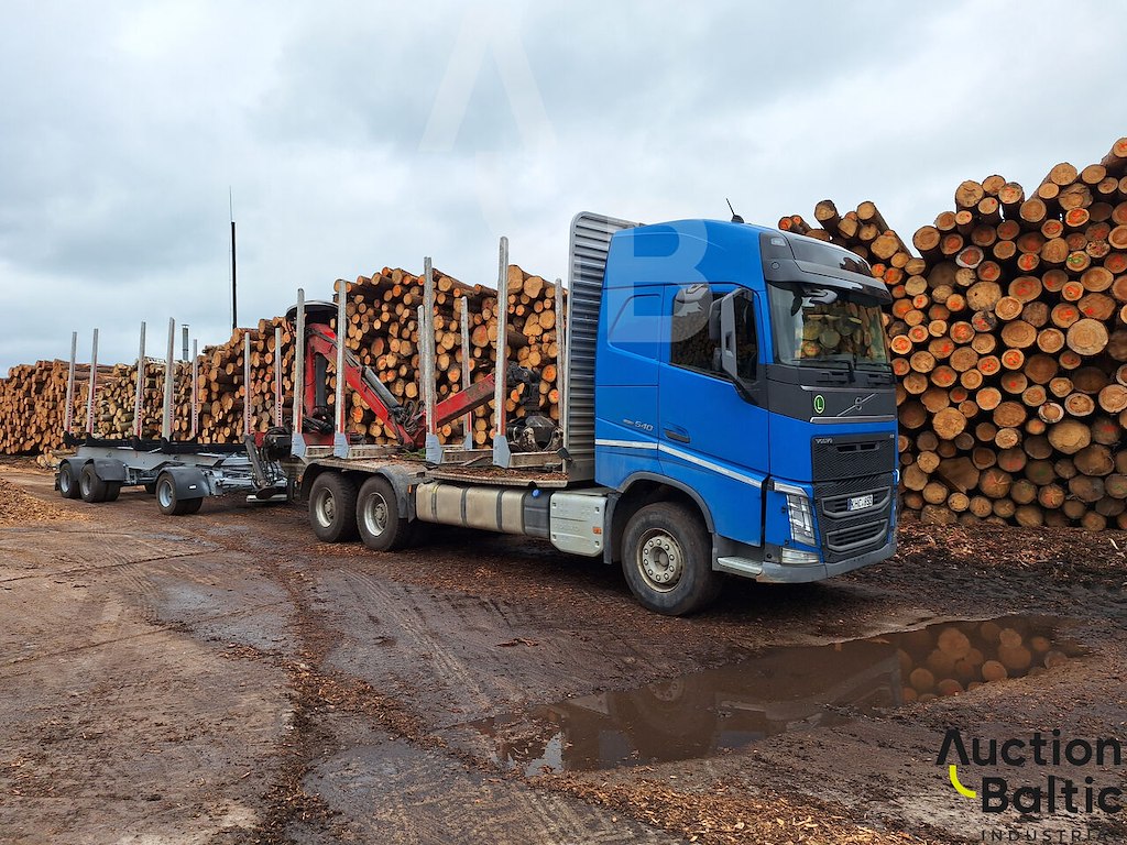 Prodaje se Volvo FH540 kamion za prevoz drva na aukciji + šumarska prikolica