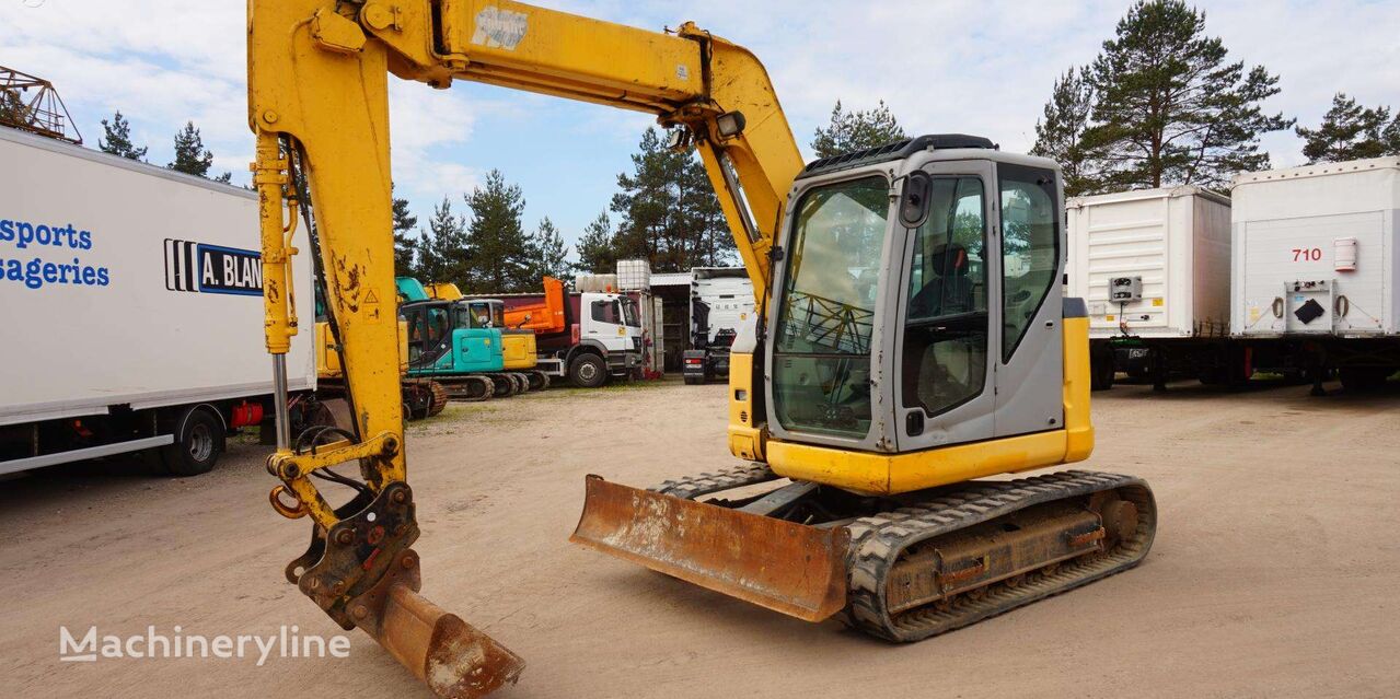 New Holland E70BSR-2 bager guseničar