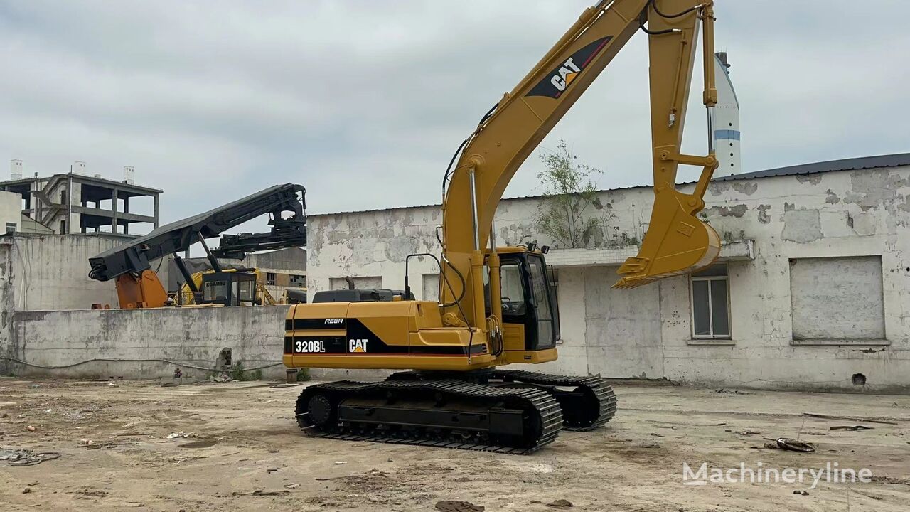 Caterpillar 320BL bager guseničar